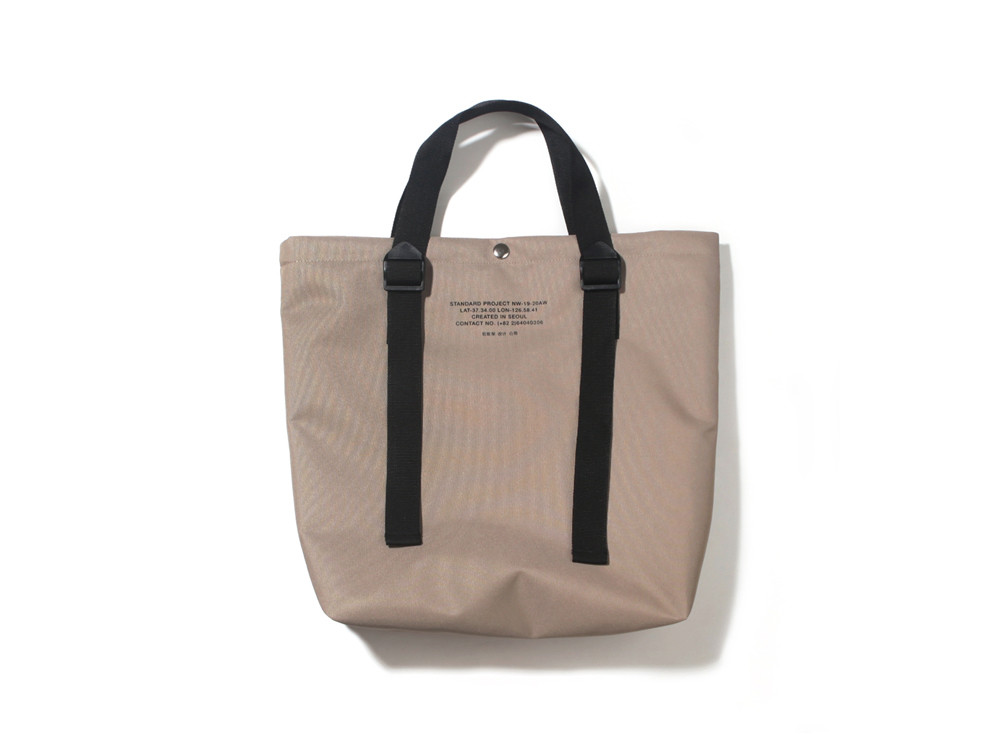 MOVE HANDLE CROSS-BEIGE