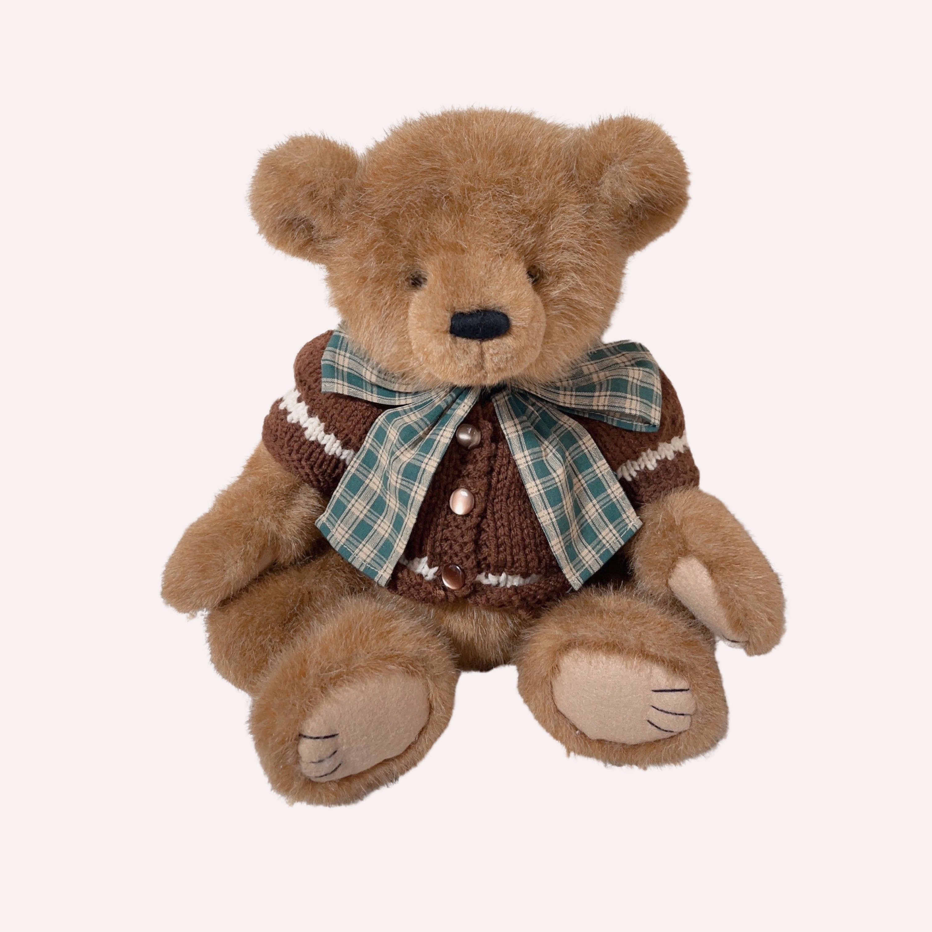 Brown knit sitting big boyds bear